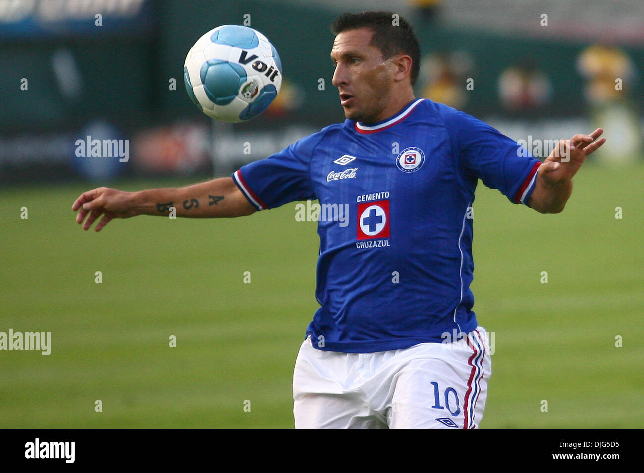 Cruz Azul striker Christian Gimenez tracks down an errant kick during a ...
