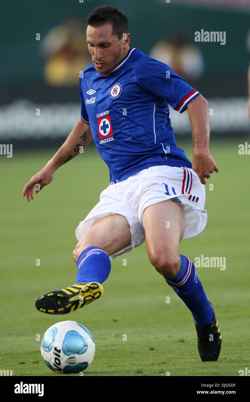Cruz Azul forward Christian Gimenez advances the ball up the pitch ...