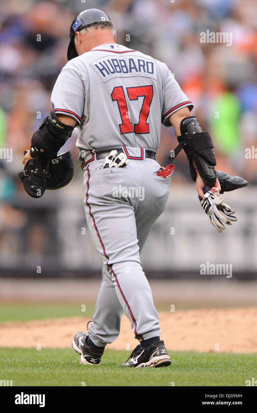 10 July, 2010: Atlanta Braves base coach Glenn Hubbard holds players ...