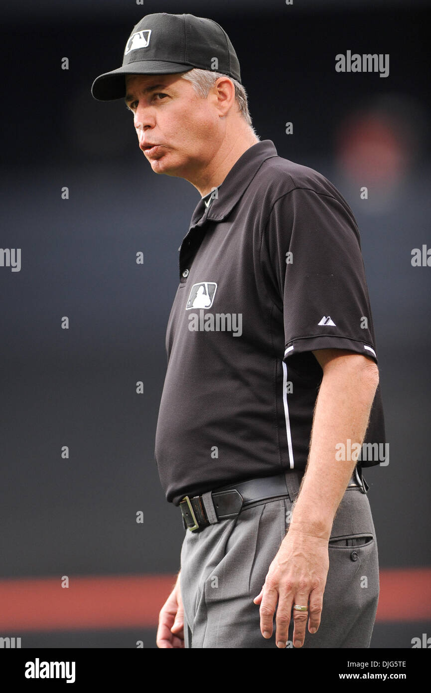 10 July, 2010: Umpire and crew chief Gary Darling discusses a call with ...