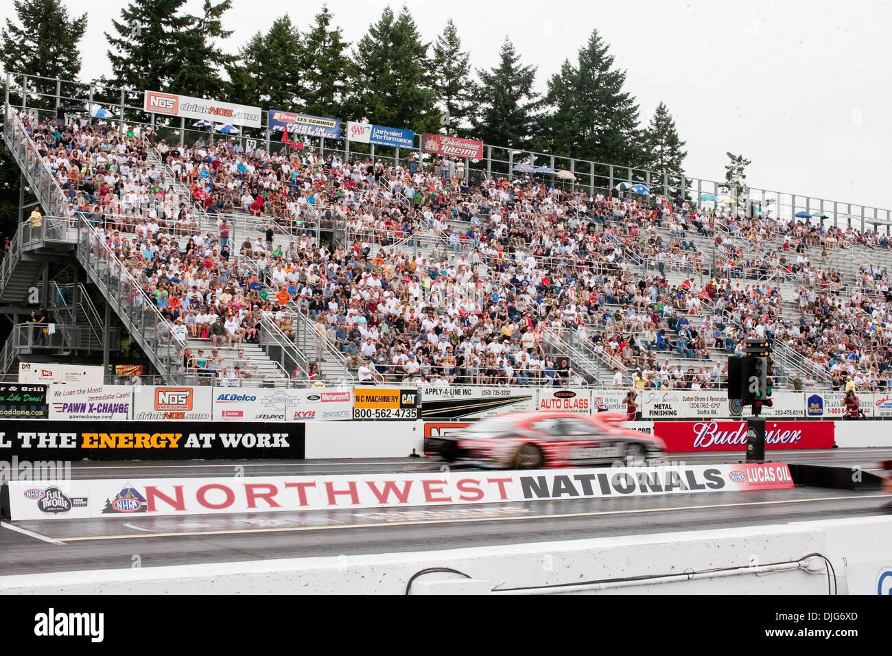 July 10th 2010, a prostock car takes off in front of the main ...