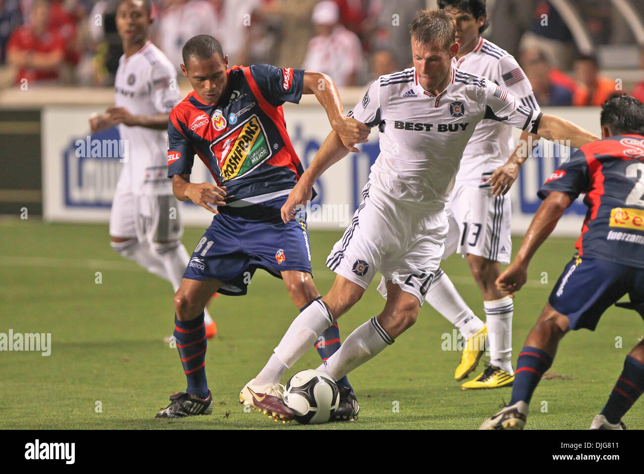 20) Brian McBride of the Chicago Fire and (#81) Aldo Ramirez of ...