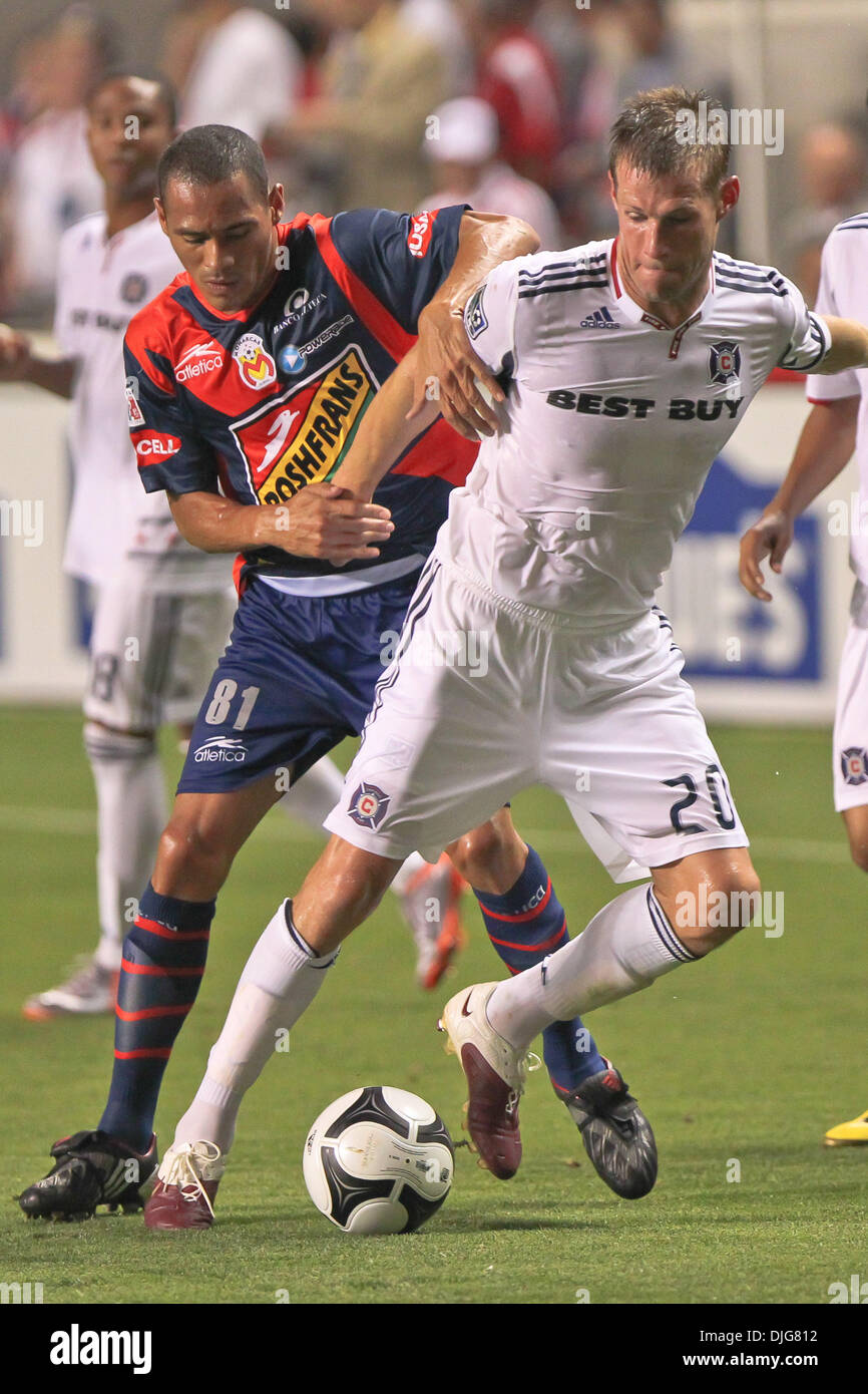 20) Brian McBride of the Chicago Fire and (#81) Aldo Ramirez of ...