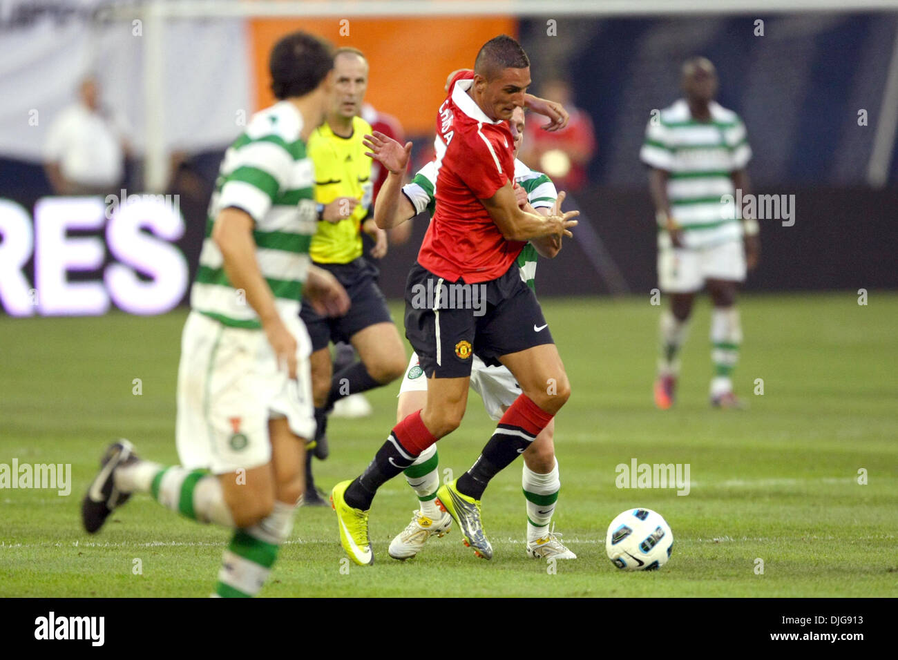 Manchester United forward Federico Macheda (27) runs upfield with the ...