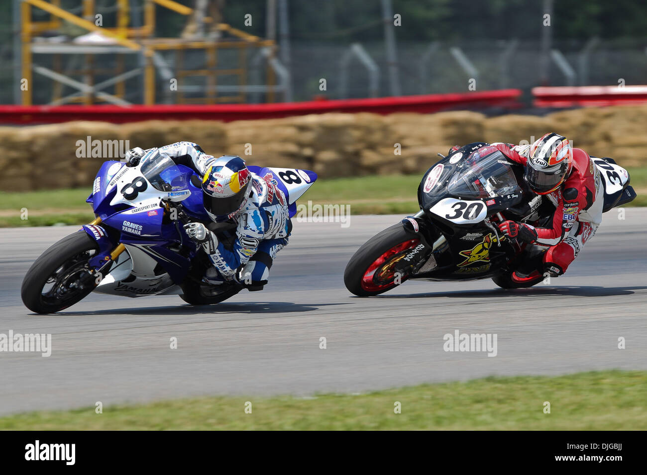 Josh Herrin (#8) and Bobby Fong (#30) battle for the lead during the ...
