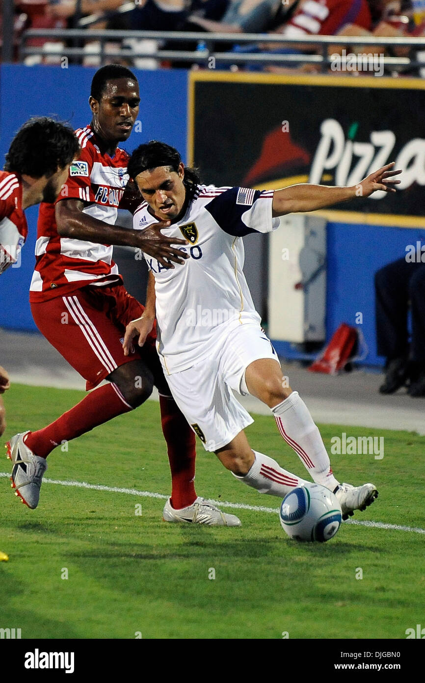 7 Fabian Espindola of REAL Salt Lake drives the ball past a FC Dallas ...