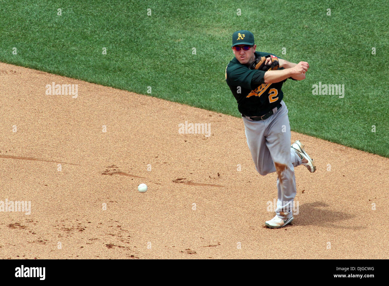 Oakland Athletics infielder Cliff Pennington throws to first during ...