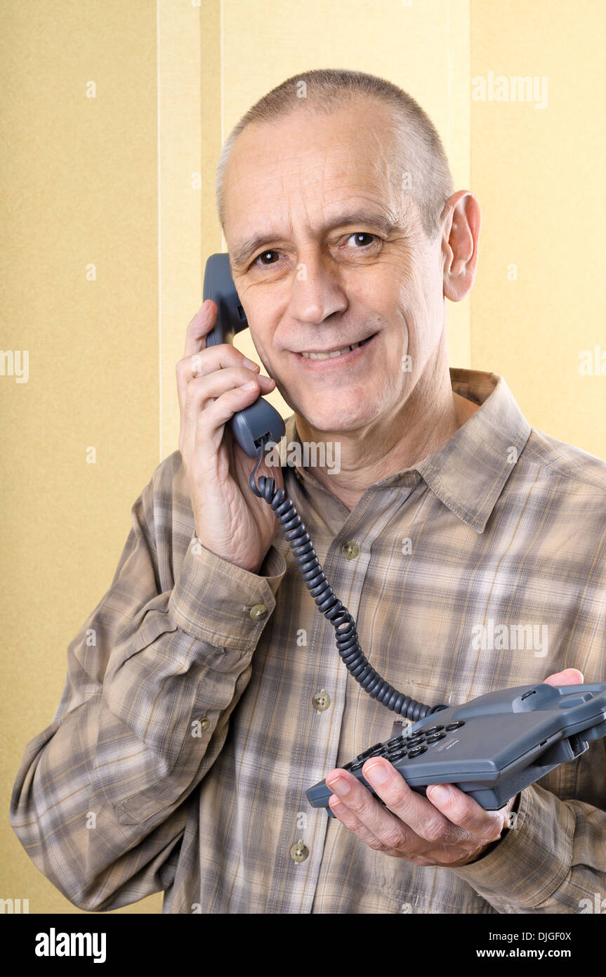 Portrait mature man speaking looking hi-res stock photography and ...