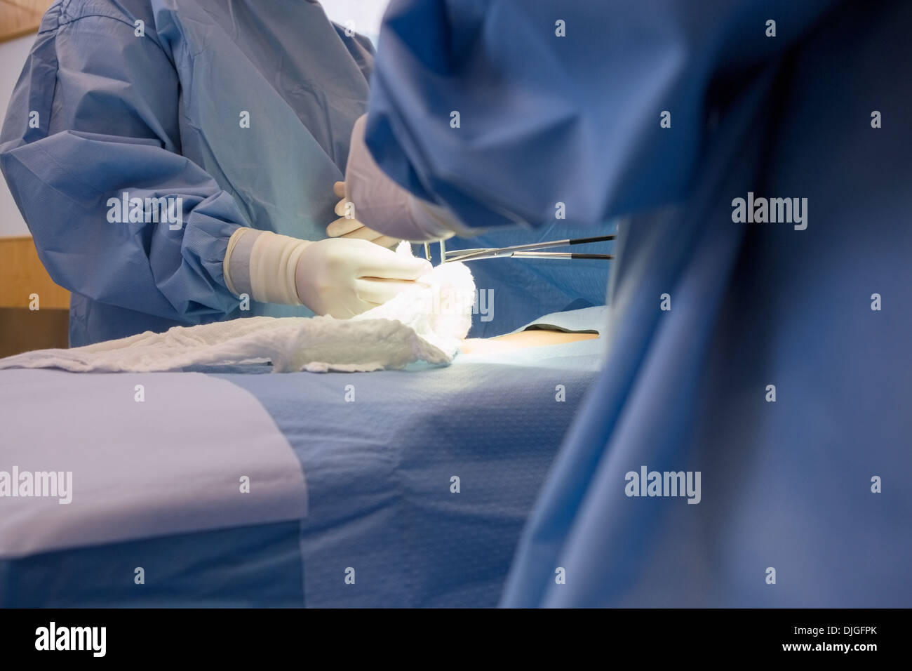 Doctors Operating Young Patient Stock Photo - Alamy