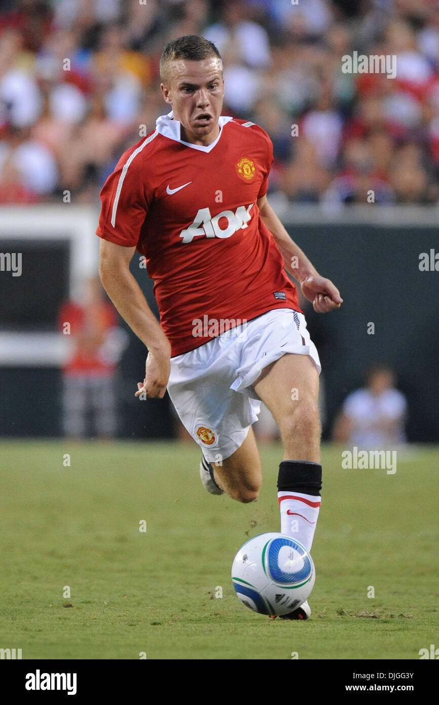 Manchester United Midfielder Tom Cleverly drives to goal as The ...