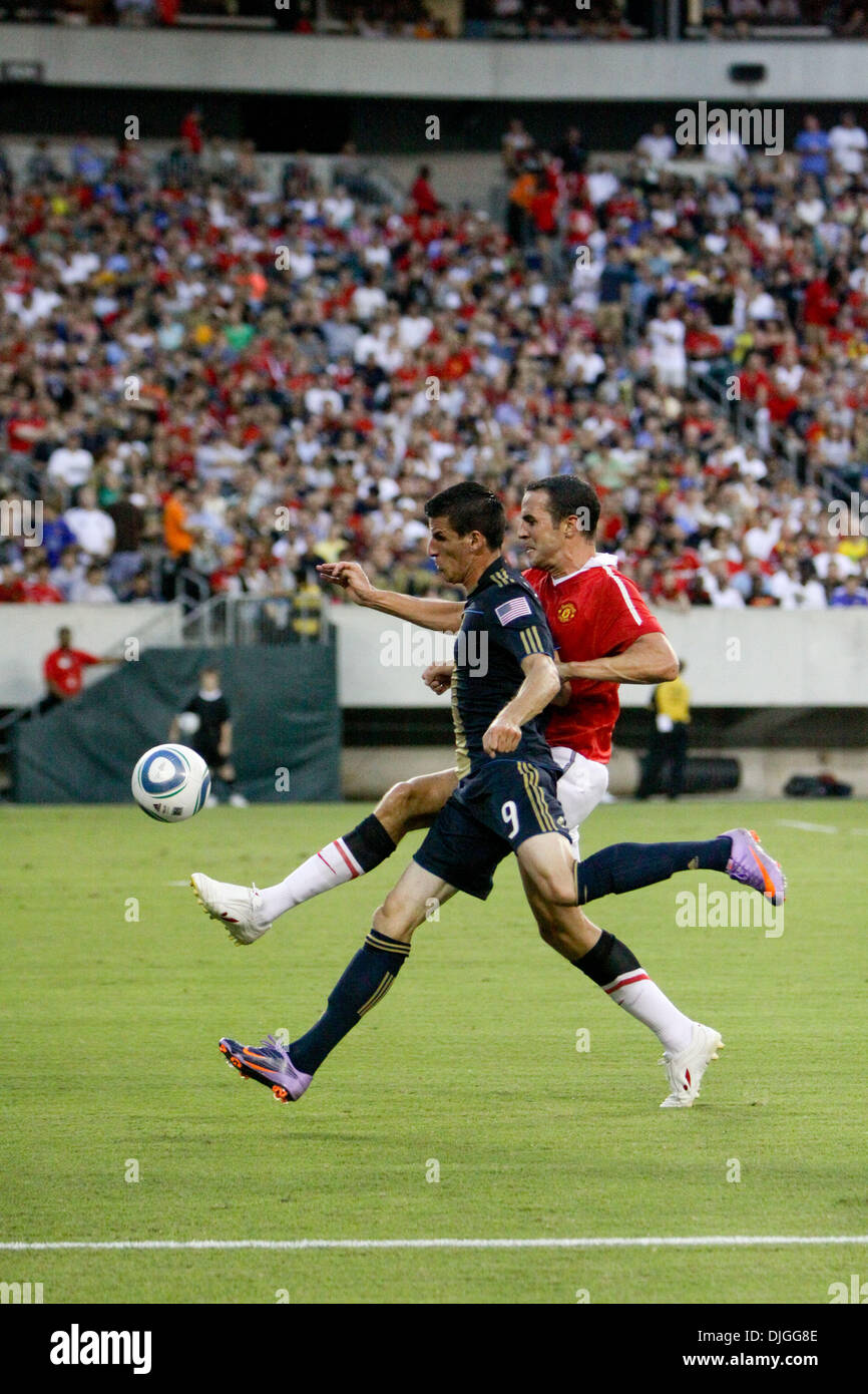 Philadelphia Union forward Sebastien Le Toux (#9) goes up against ...