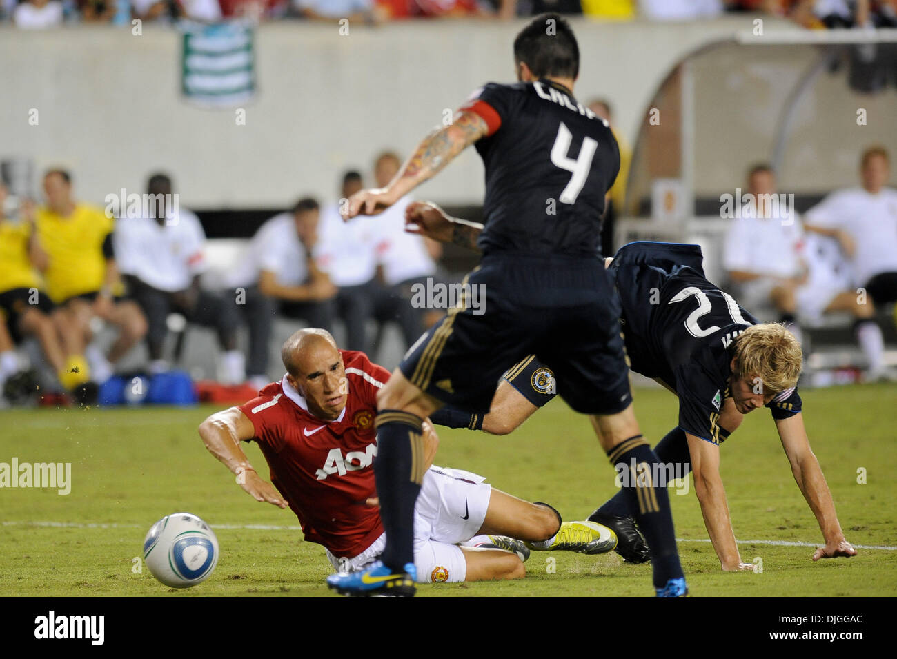 Manchester United Forward Gabriel Obertan (#26) is sandwiched between ...