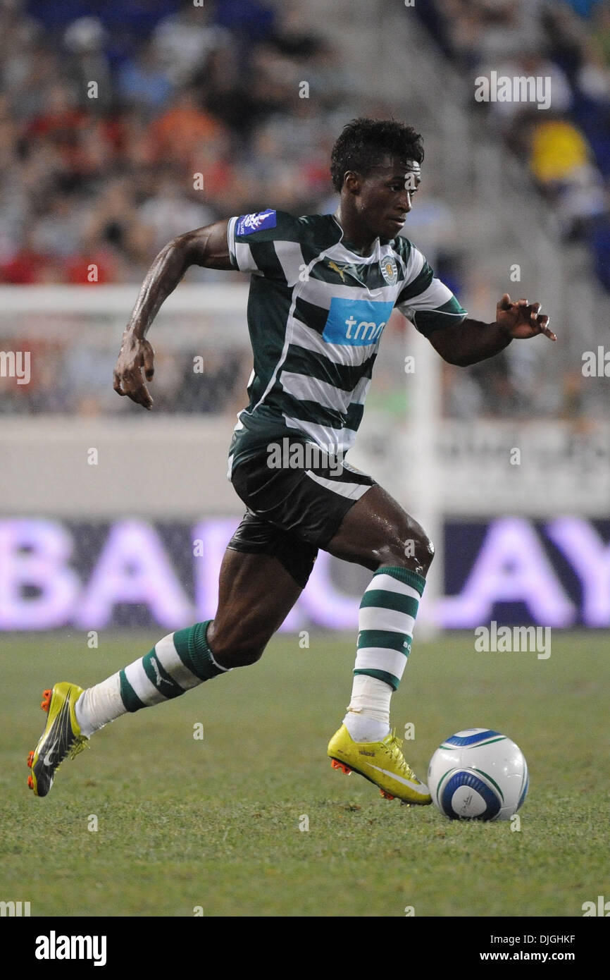 Sporting Forward Yannick (#20) drives to goal as English Premier League ...