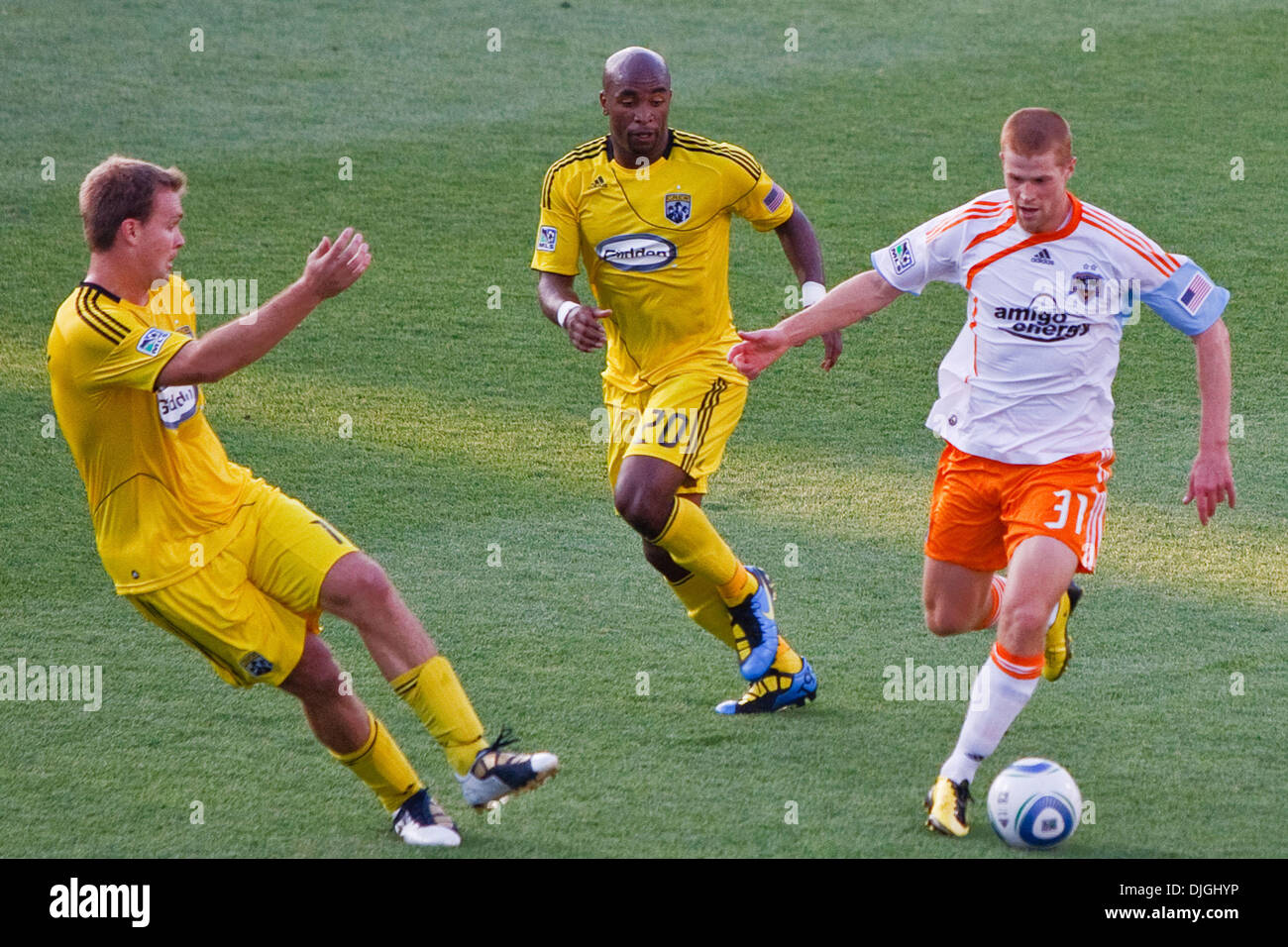Crew defender Chad Marshall (14) and forward Emilio Renteria (20) close ...