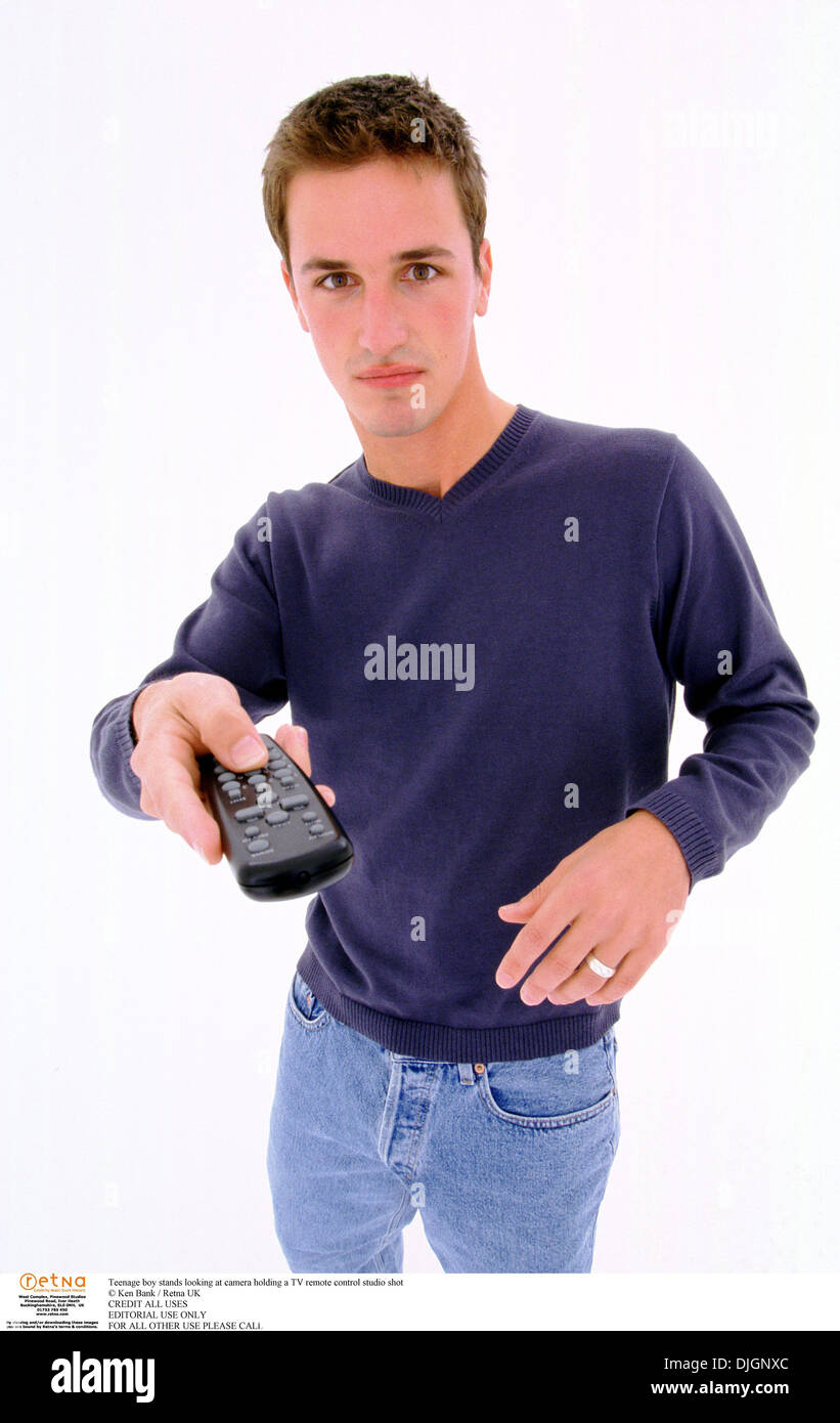 Boy television remote hi-res stock photography and images - Alamy