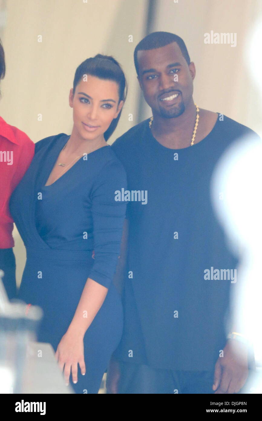 Kim Kardashian and boyfriend Kanye West attend the grand opening for ...
