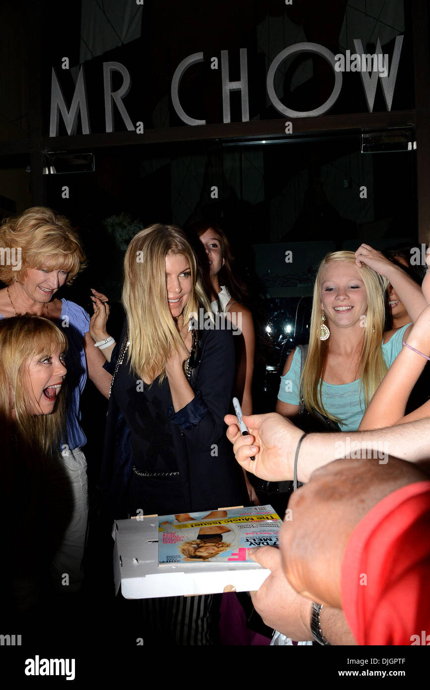 Fergie aka Stacy Ferguson meets with fans outside Mr Chow after eating ...