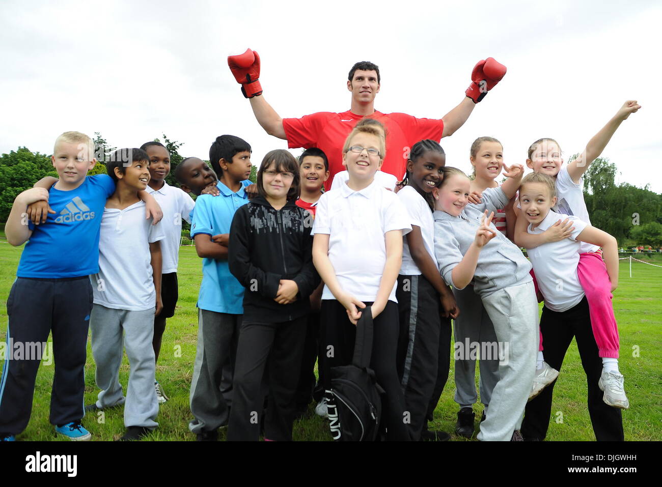Lance Brooks (Discus) spars with students Olympic Team USA take part in ...