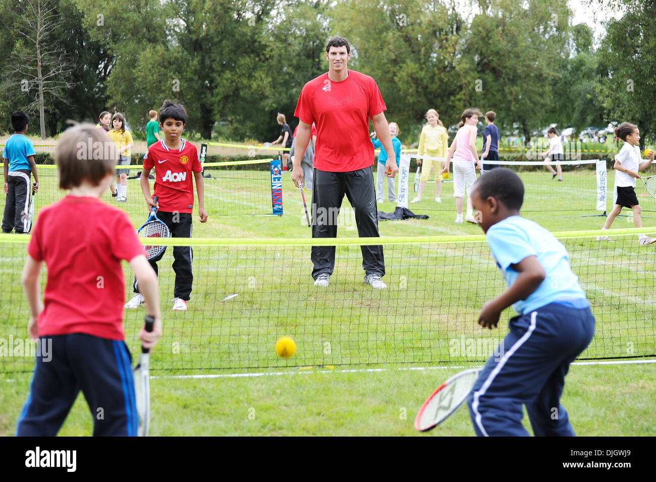 Lance Brooks (Discus) Olympic Team USA take part in a sports festival for city schoolchildren at ...