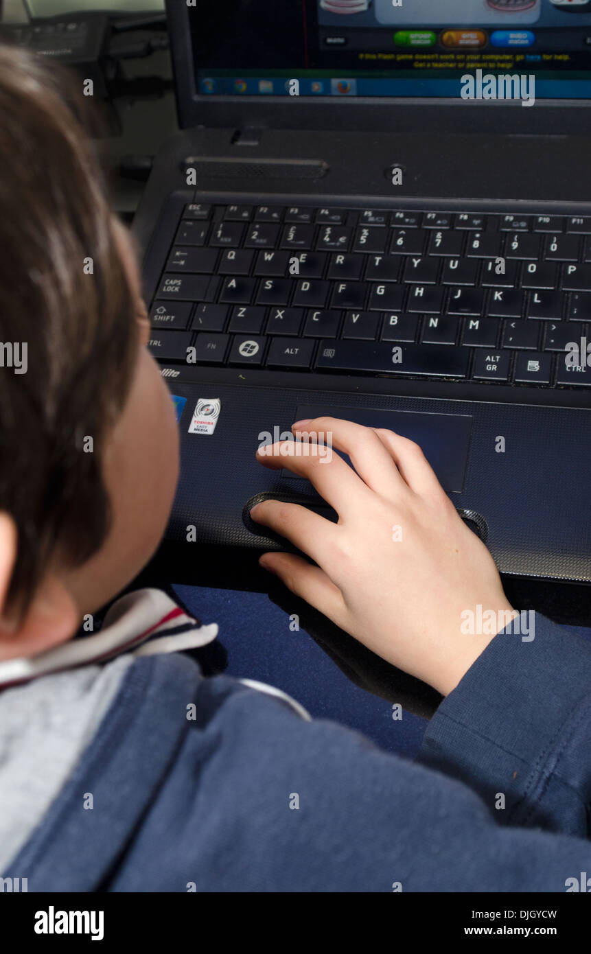 Boy computer typing hi-res stock photography and images - Alamy