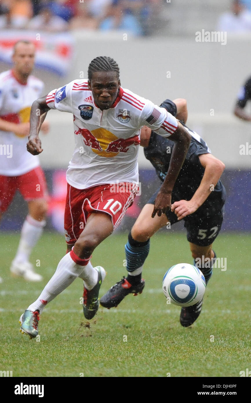 New York Red Bulls Midfielder Macoumbe Kandji (10) and Manchester City ...