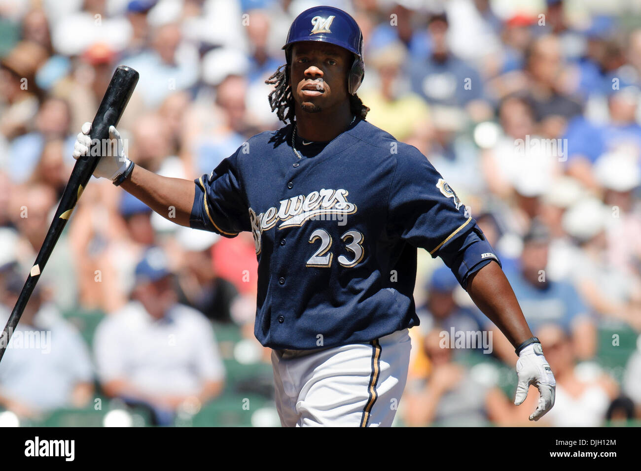 Milwaukee Brewers' Rickie Weeks (23) returns to the dugout after striking out in the 2nd inning ...