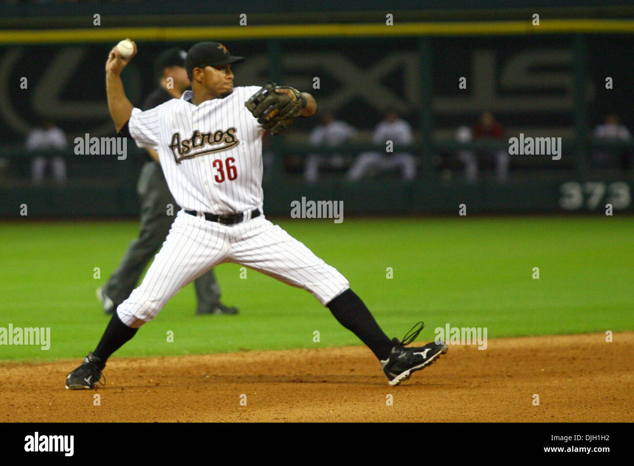 Houston Astros short stop Angel Sanchez (36) makes the grab and throws ...