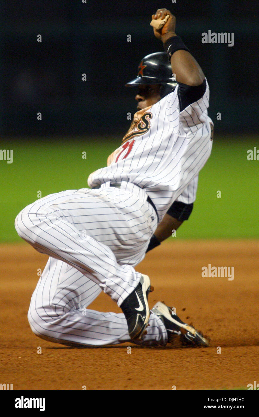 Houston Astros Outfielder Jason Bourgeois (11) slides into third base ...