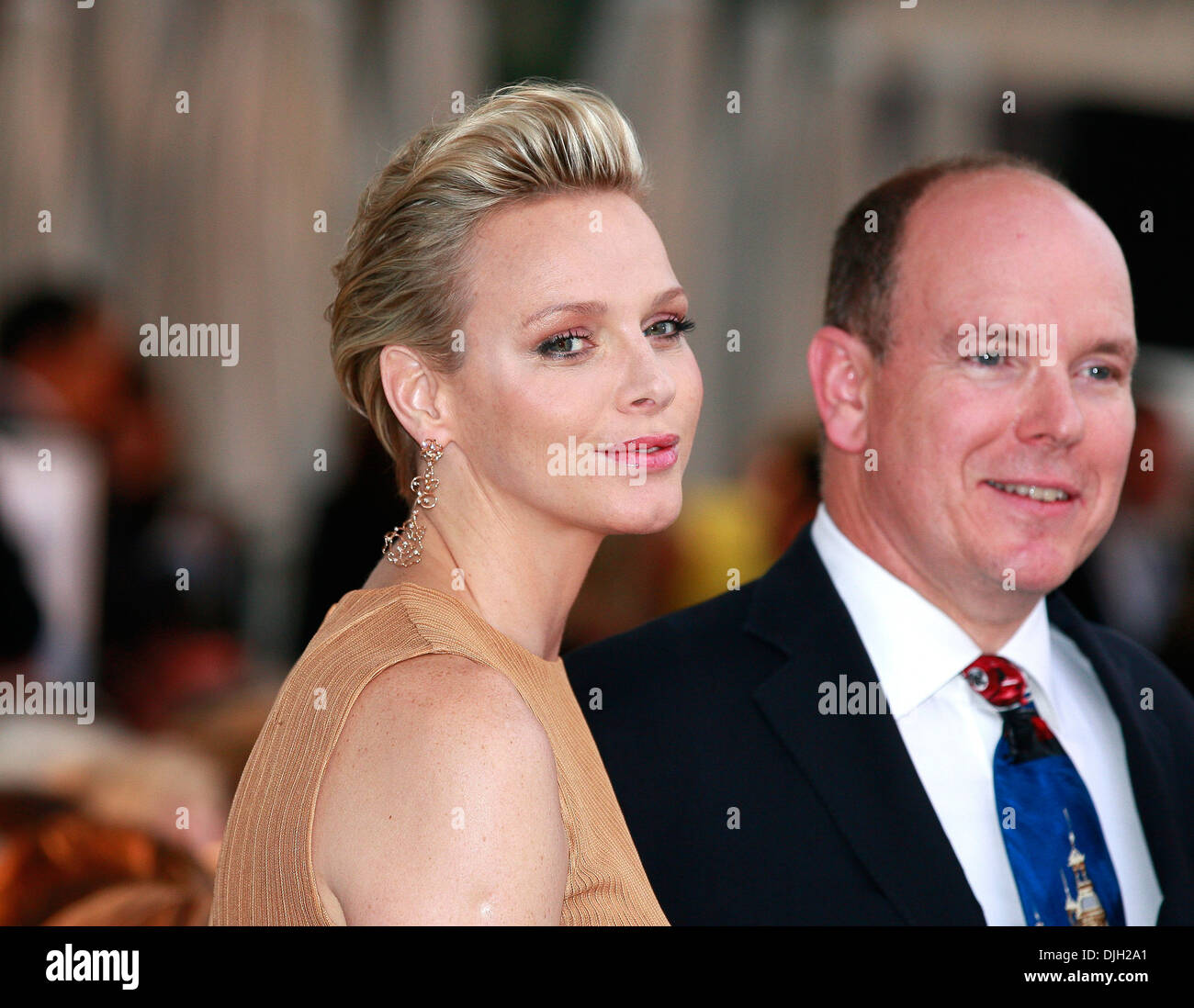 Prince Albert II of Monaco and Princess Charlene of Monaco Amber Fashion Show and Charity ...