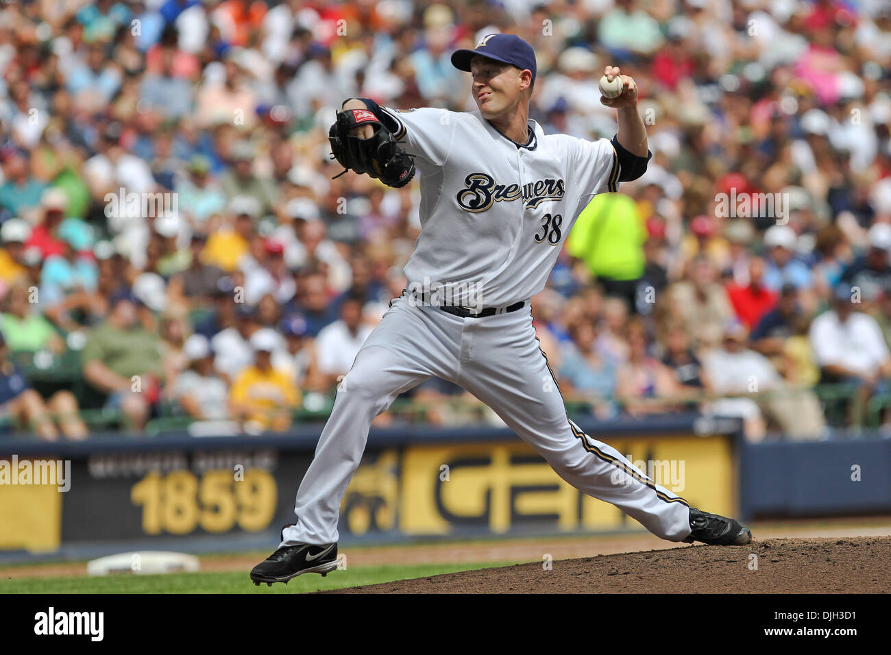 Relief pitcher Chris Narveson (#38) of the Brewers delivers a pitch ...