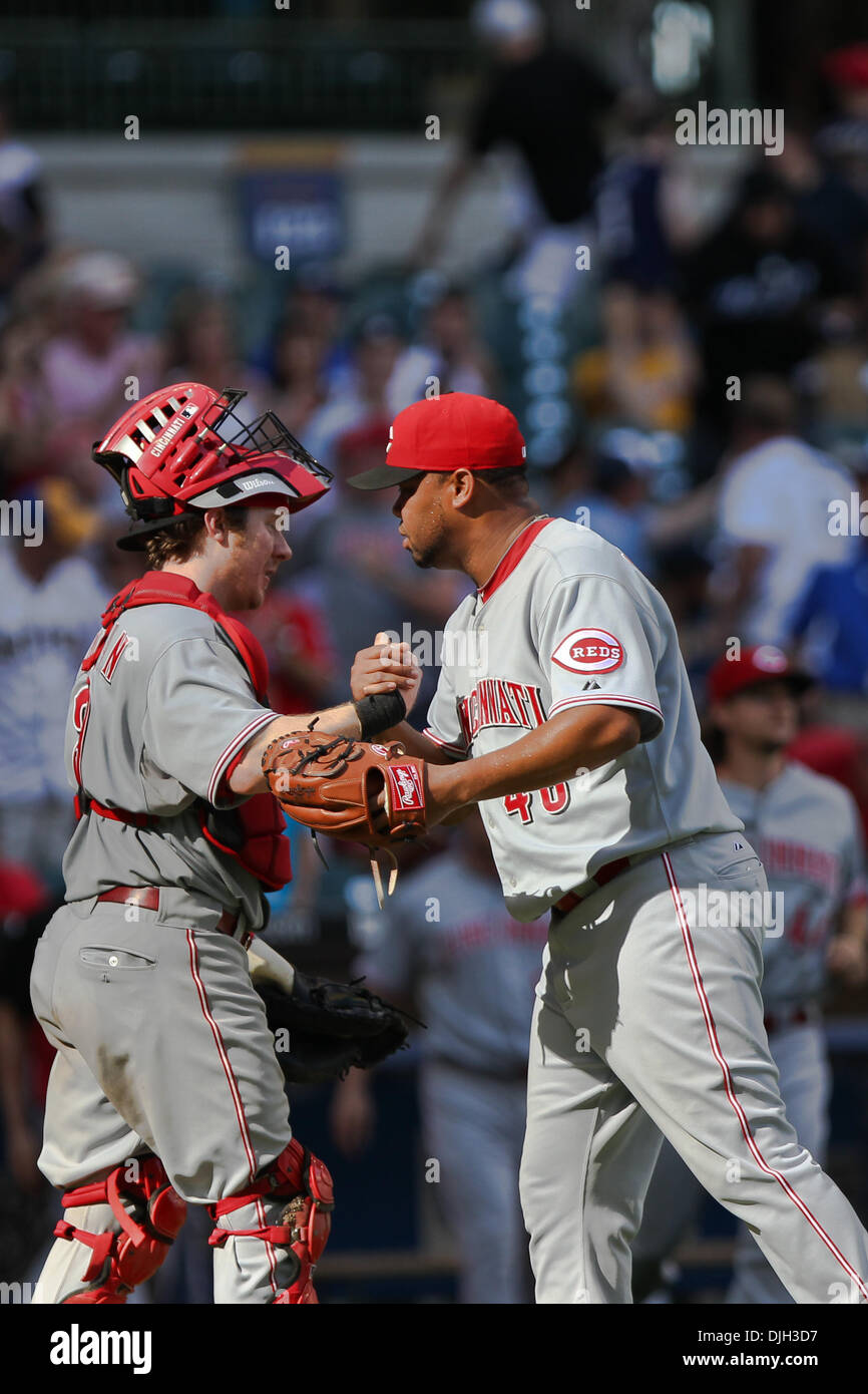 Reds catcher Ryan Hanigan (#29) congratulates relief pitcher Francisco ...