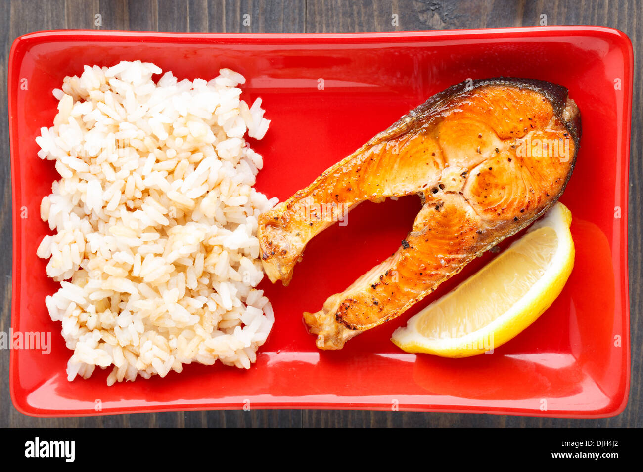 Fried salmon with rice Stock Photo - Alamy