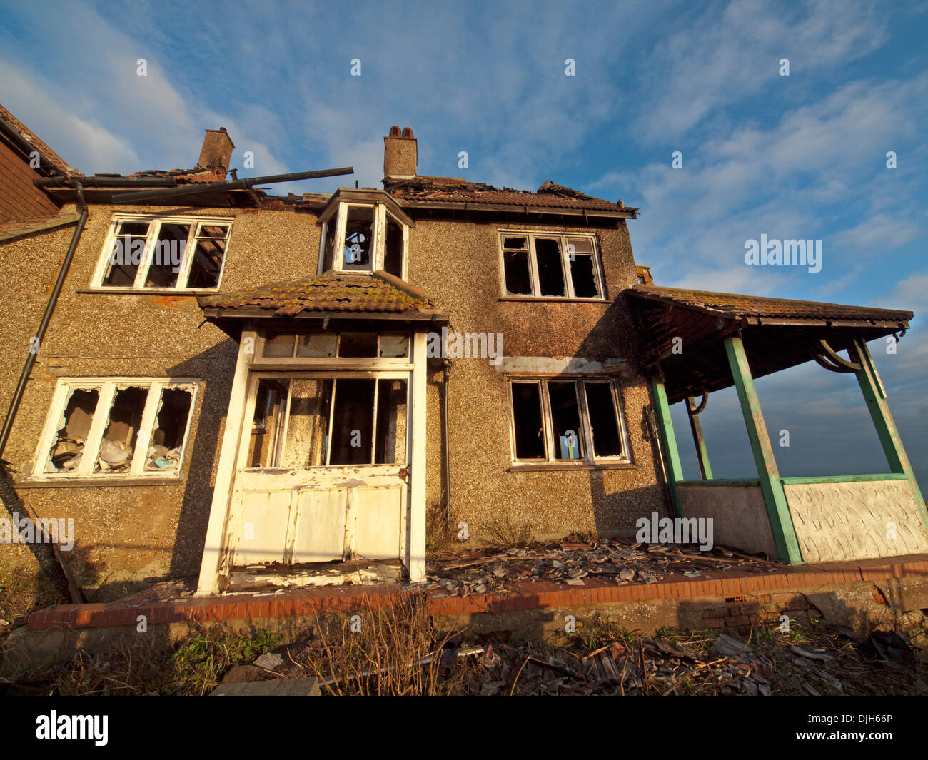 A house on the South Coast seafront that has been seriously damaged by ...