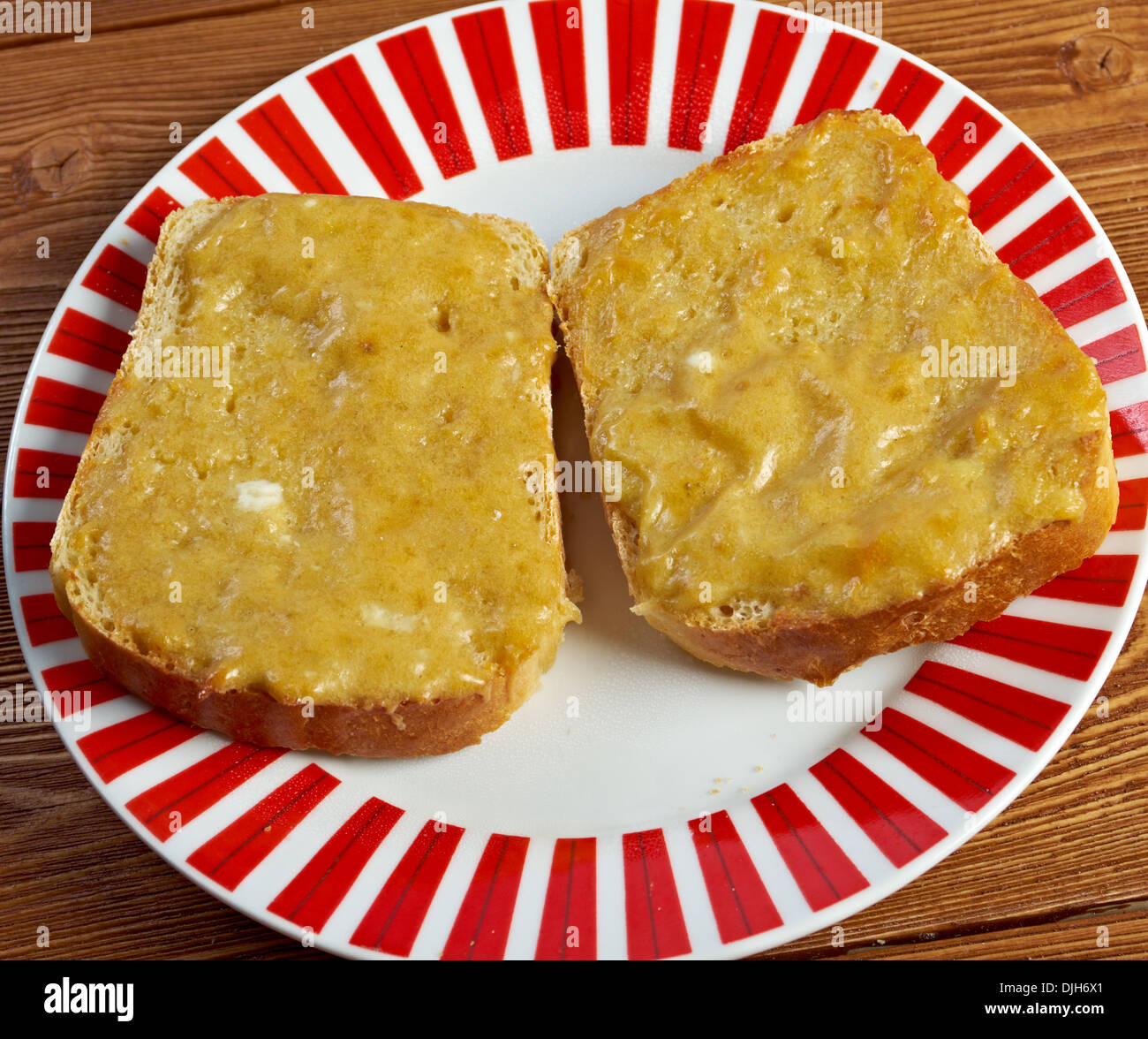 Welsh Rarebit - Toasted bread with melted cheddar cheese Stock Photo ...