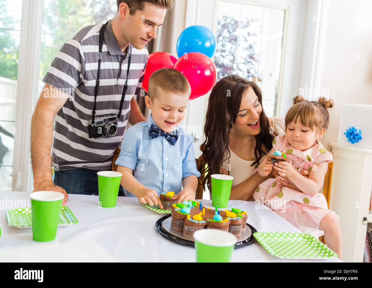Family Celebrating Birthday Party At Home Stock Photo - Alamy