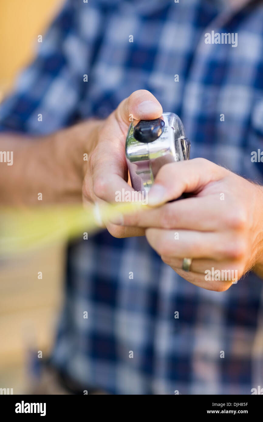 Holding tape measure hi-res stock photography and images - Alamy