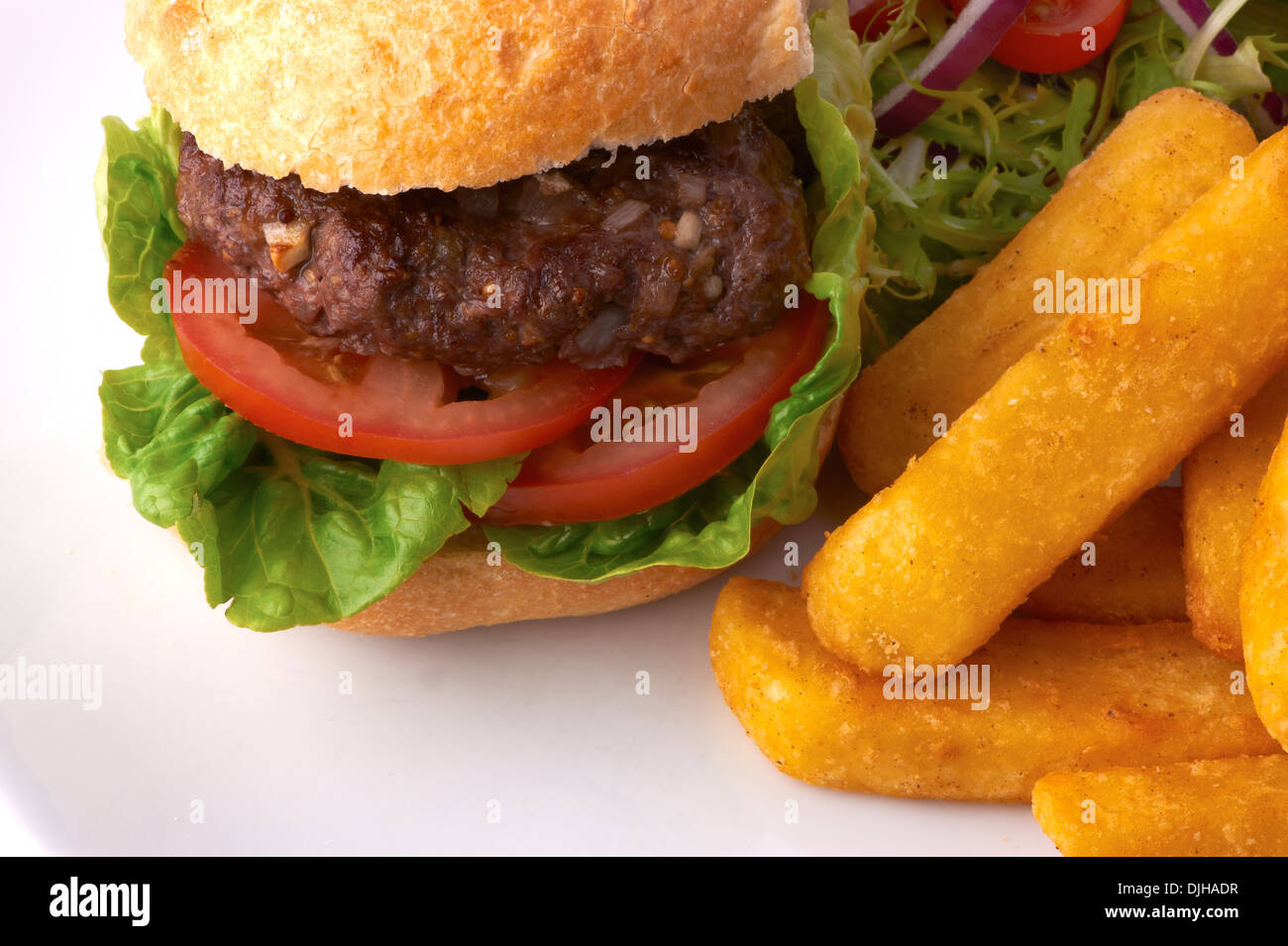 Beef Burger in a bun with chips Stock Photo - Alamy