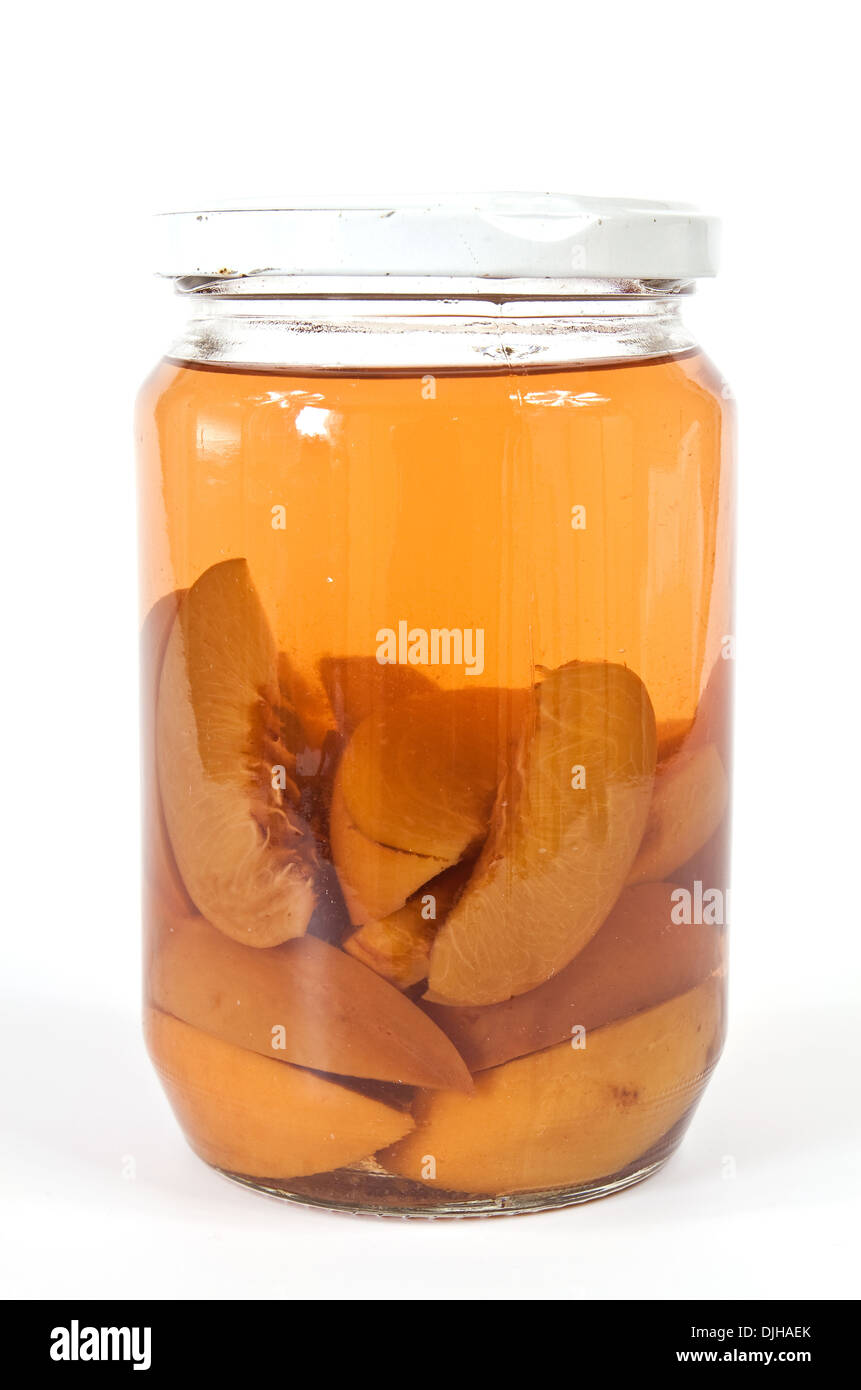 Compote made of chopped fresh fruit with sugar syrup enclosed in glass ...