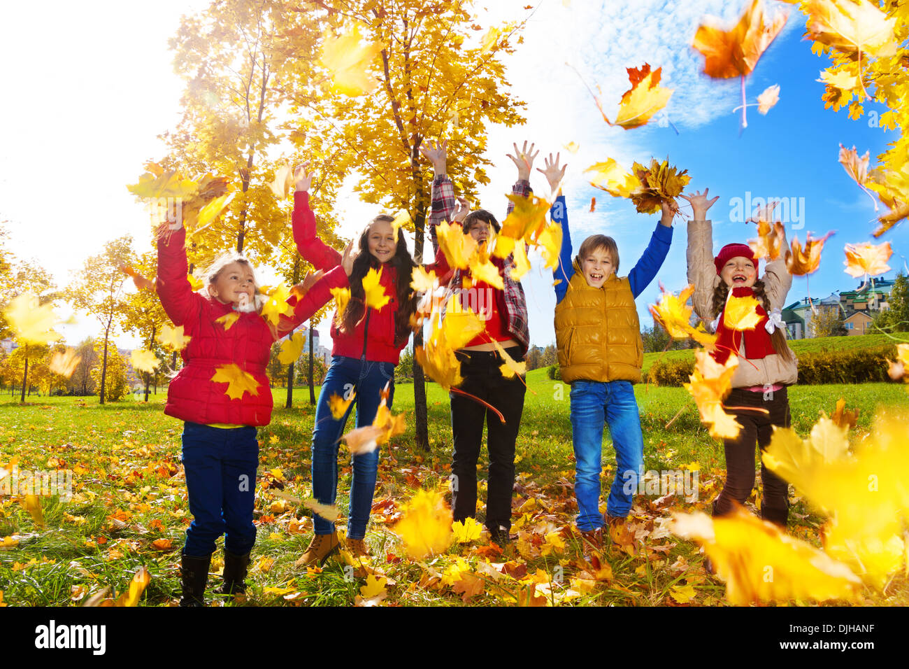 Autumn people with children with girls with outdoor leaves hi-res stock ...