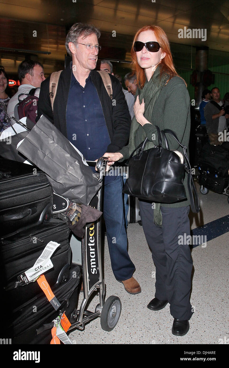 Marcia Cross and husband Tom Mahoney Celebrities seen at LAX airport ...