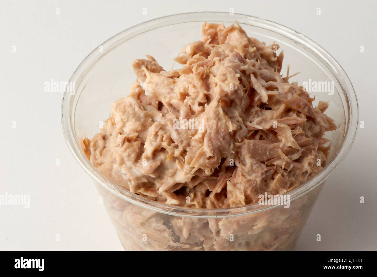 Tuna fish in a plastic pot Stock Photo - Alamy
