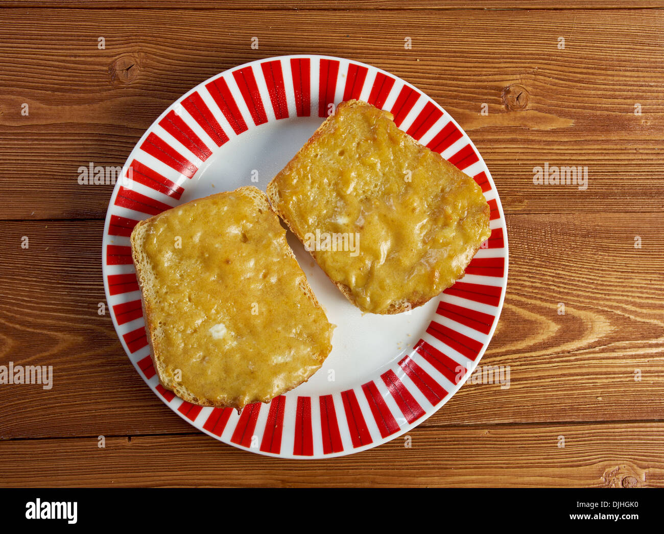Welsh Rarebit - Toasted bread with melted cheddar cheese Stock Photo ...