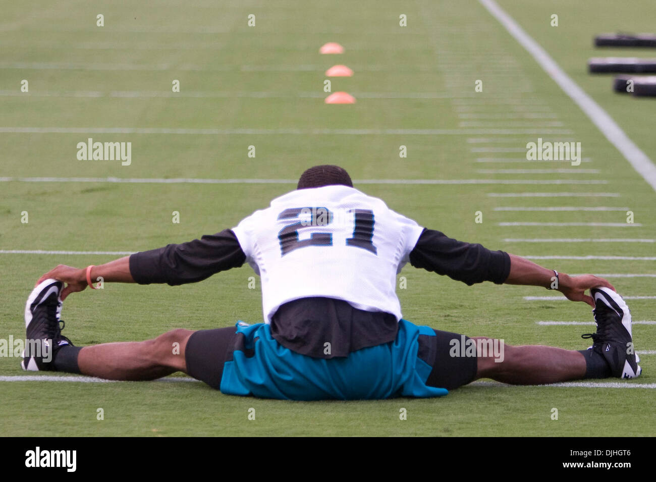 Derek Cox (21) of the Jacksonville Jaguars stretches during the first ...