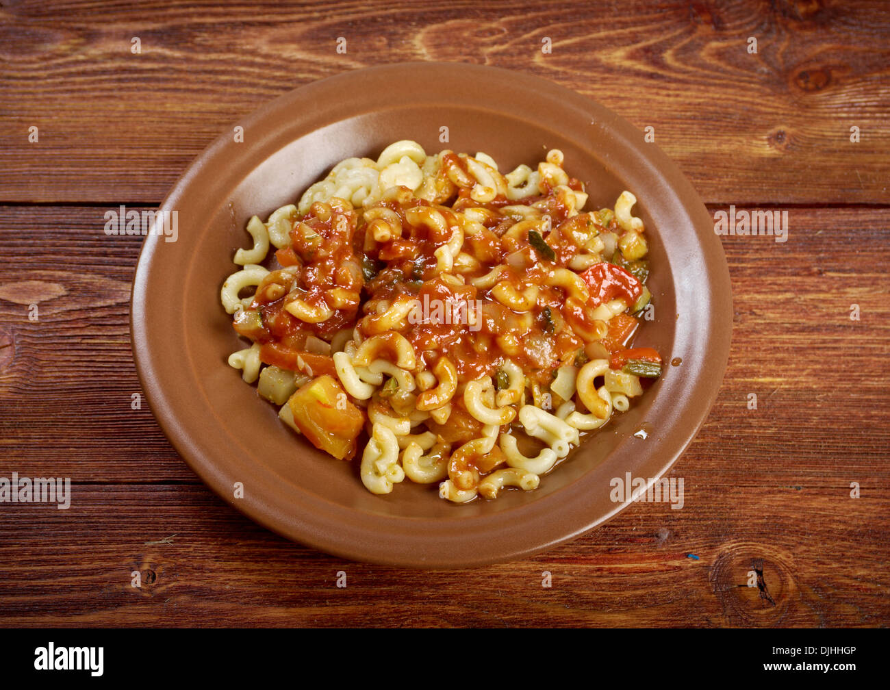 homemade elbow macaroni pasta with vegetable and tomato sauce Stock ...