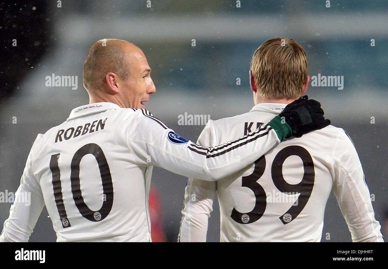 Moscow, Russia. 27th Nov, 2013. Munich's Arjen Robben (L) and Toni ...