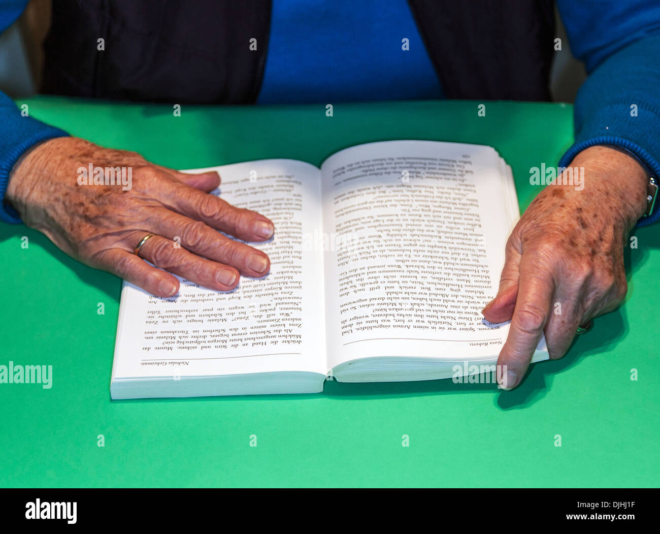 Reading a novel Stock Photo - Alamy