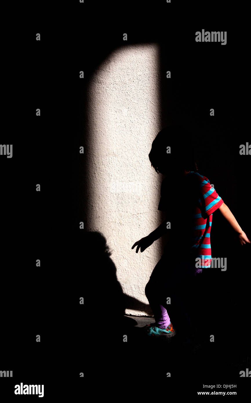 Boy shadow wall hi-res stock photography and images - Alamy