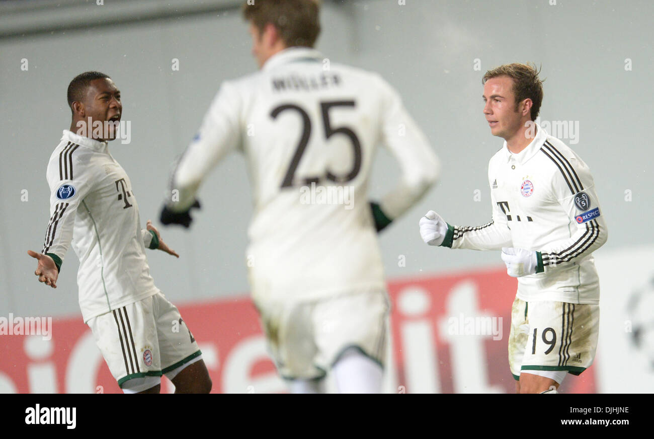 Moscow, Russia. 27th Nov, 2013. Munich's Mario Goetze (R) celebrates ...