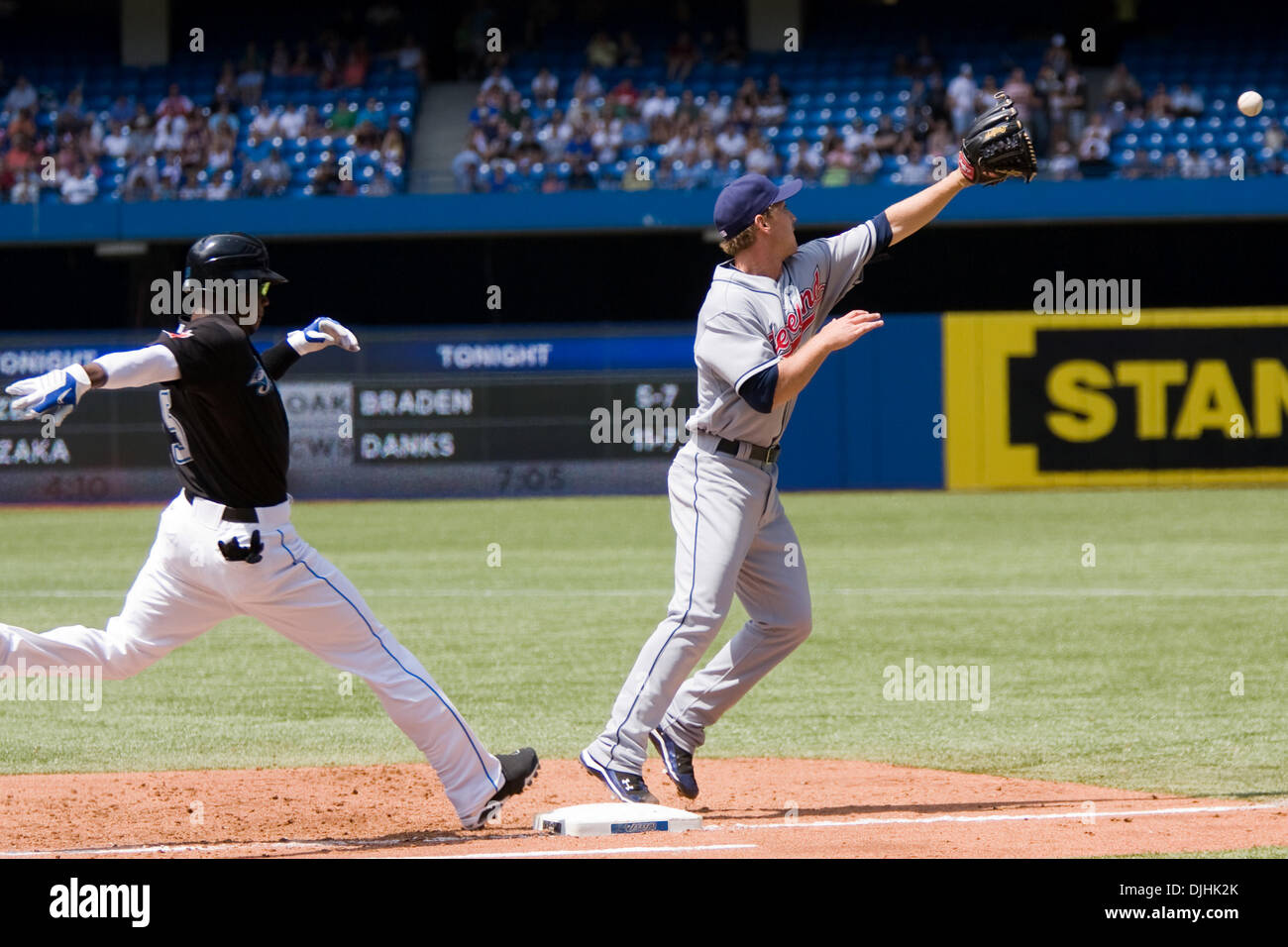 31 July 2010: Toronto Blue Jays left fielder Fred Lewis (15) is safe at ...