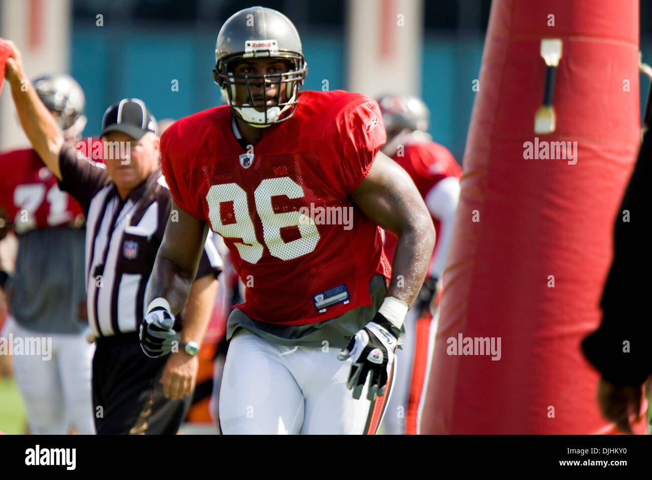 Tampa Buccaneer DE Tim Crowder (#96) runs through drills during ...
